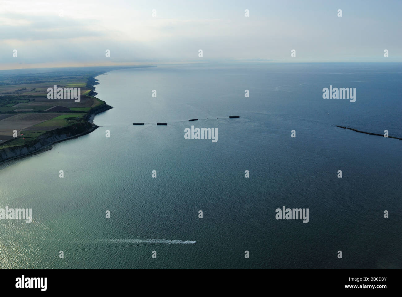 Remains of the artificial harbour Mulberry B in Arromanches Stock Photo ...