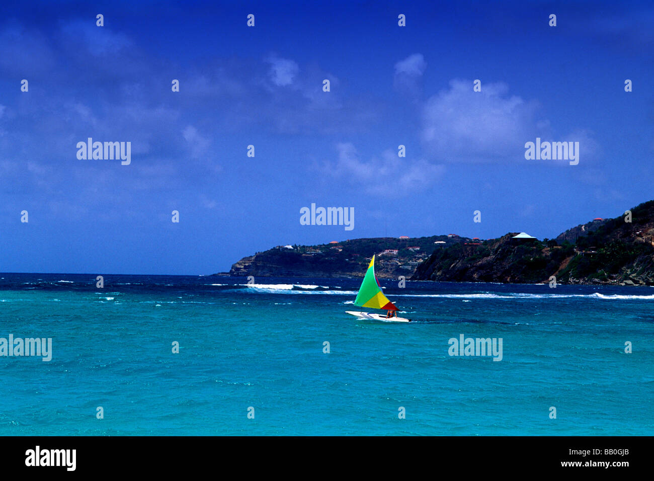 Sailing Bale De St Jean St Barths at sunset Stock Photo - Alamy