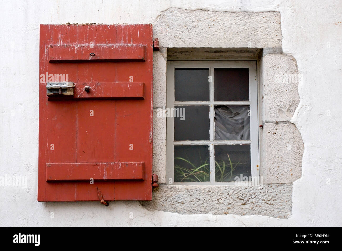 window with red shutter in white wall Stock Photo - Alamy