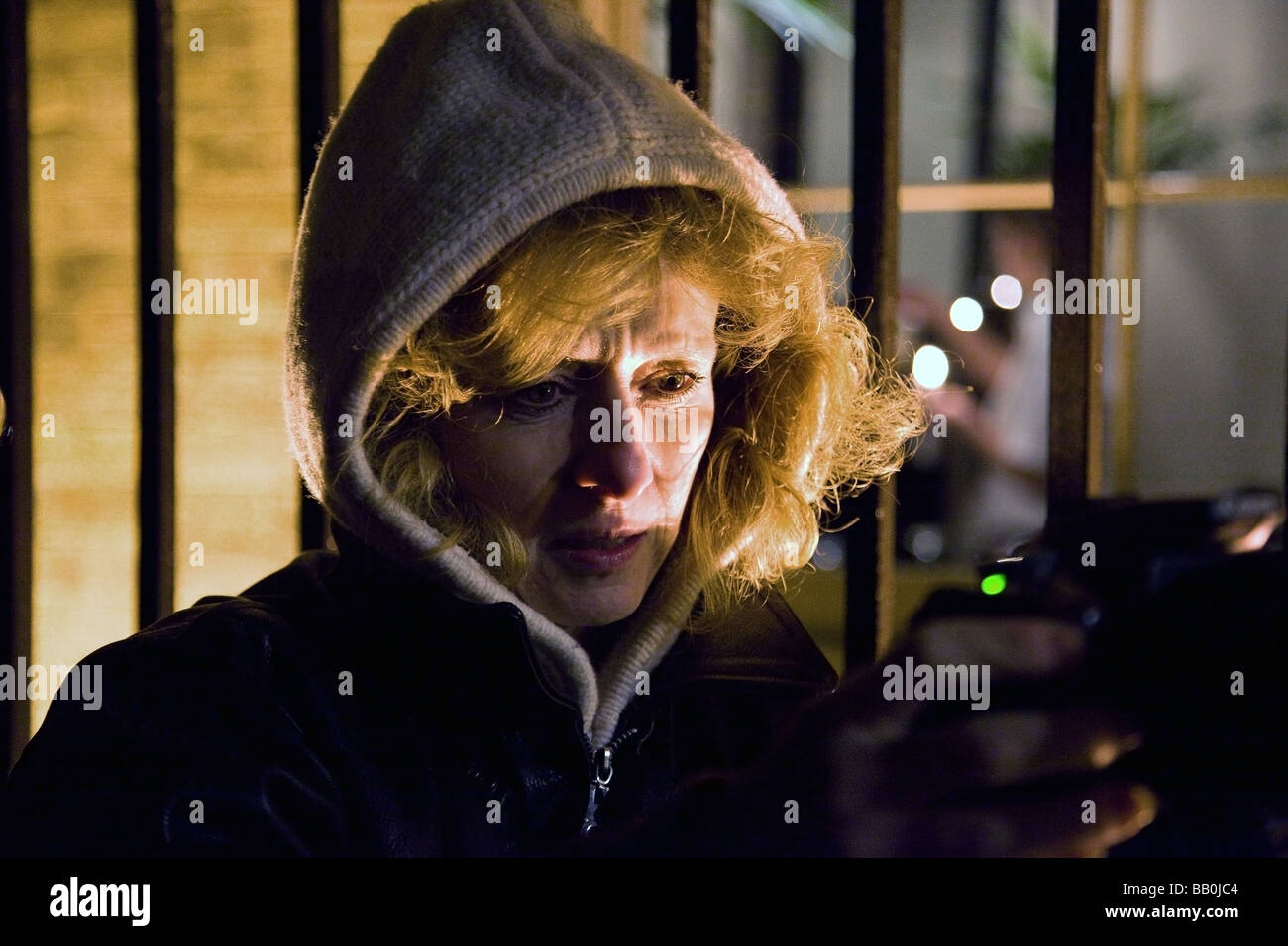 A female out on a cold night Stock Photo - Alamy