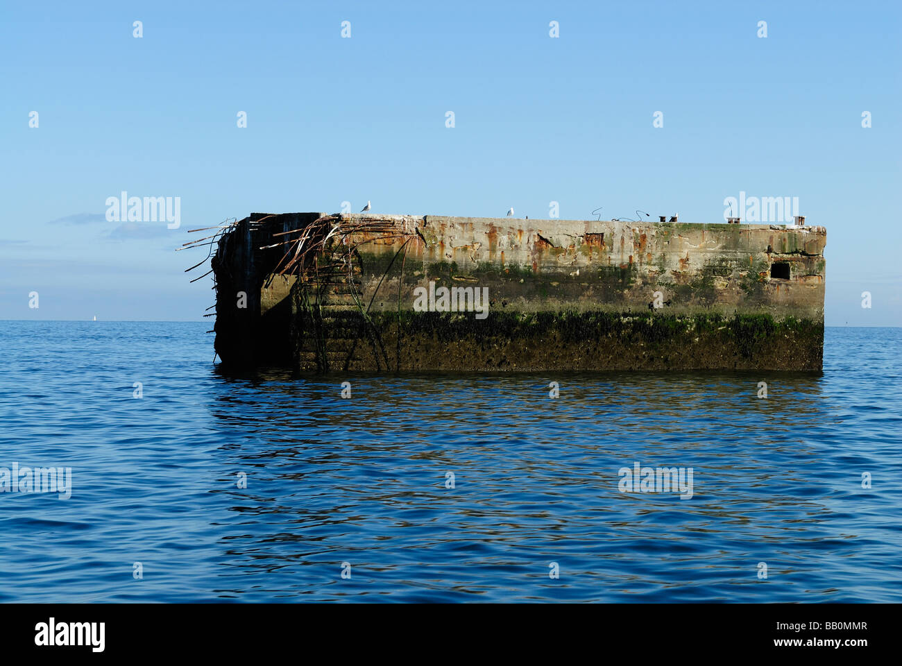 Remains of the artificial harbour Mulberry B in Arromanches Stock Photo ...