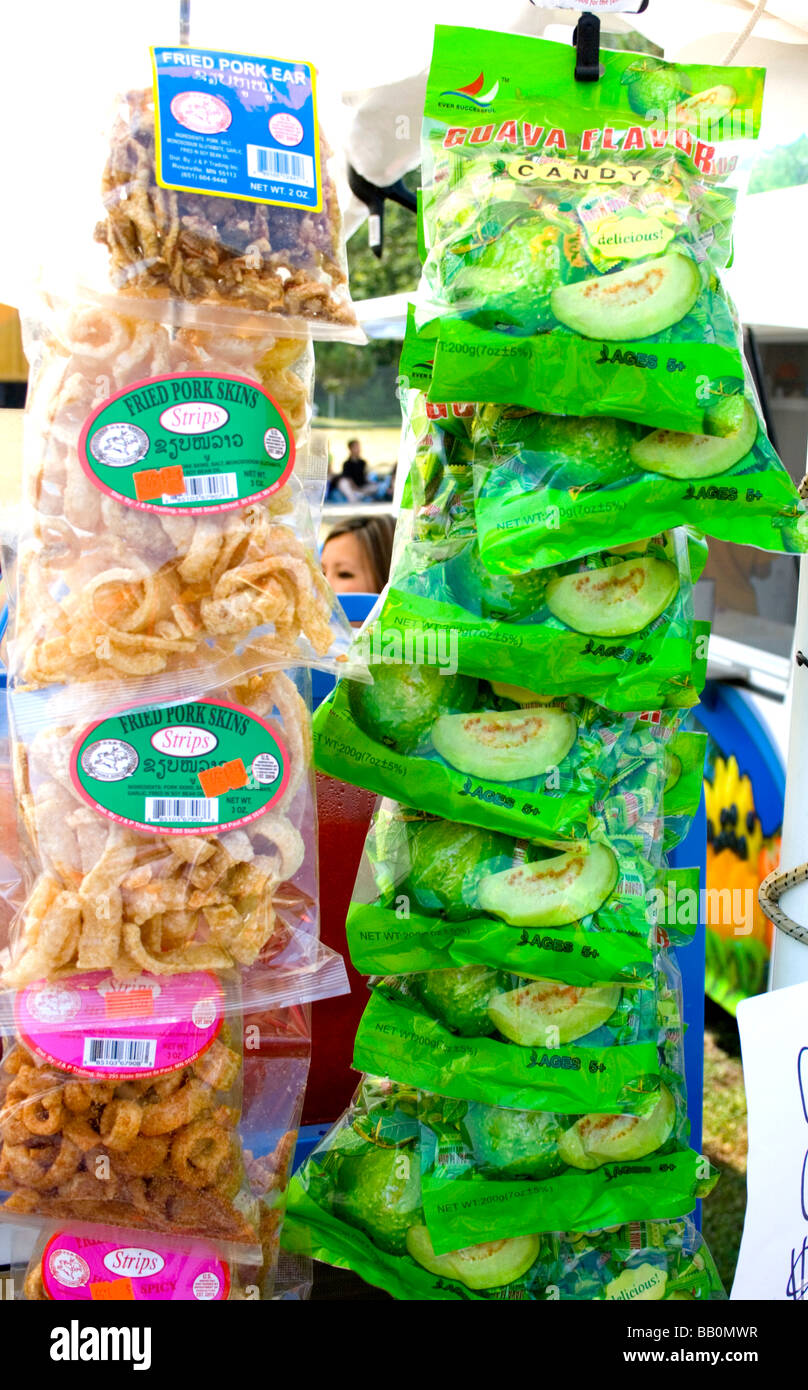 Snack packages of Guava flavor candy and fried pork skins and ear ...