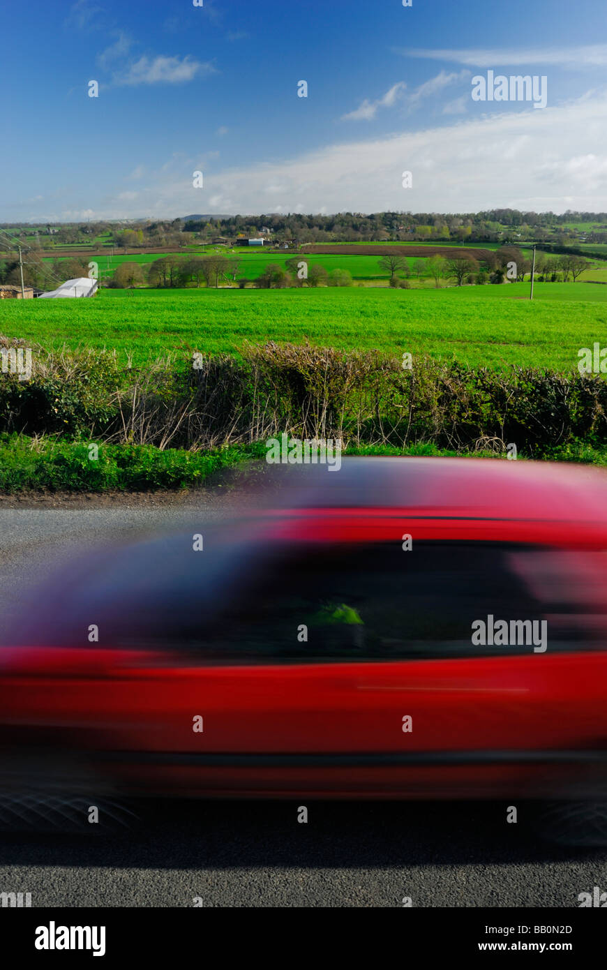 Speeding motor car in rural England UK Stock Photo - Alamy