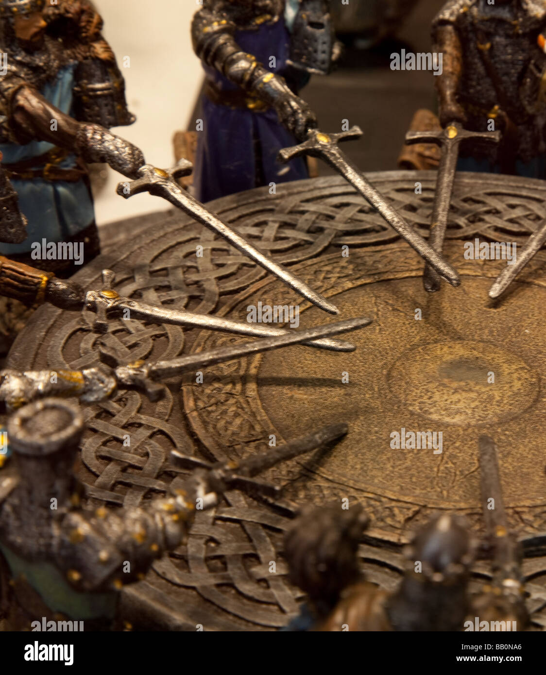 Swords on the rond table Stock Photo - Alamy