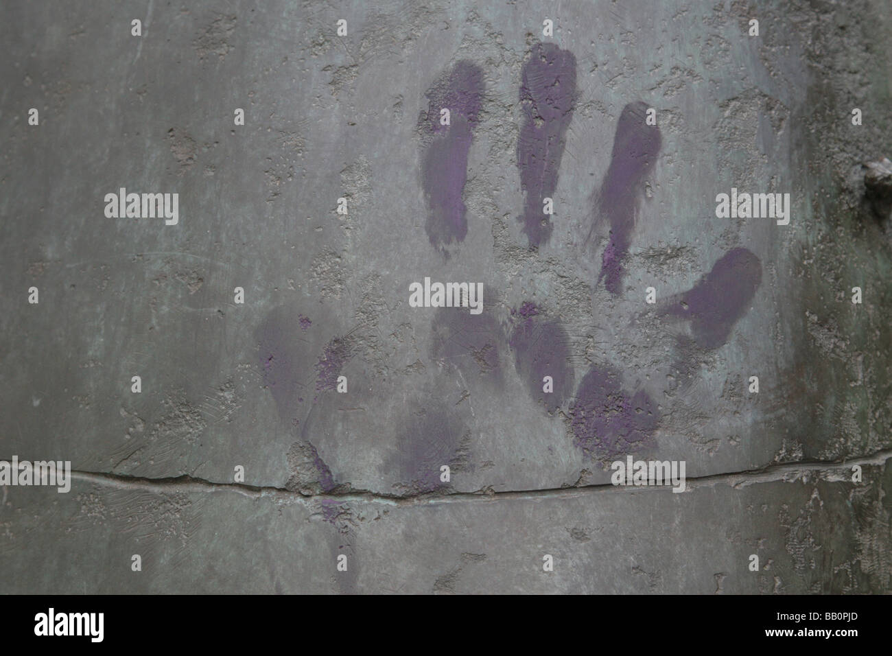 Purple Pain Hand Graffiti on Grey Concrete Wall Stock Photo - Alamy