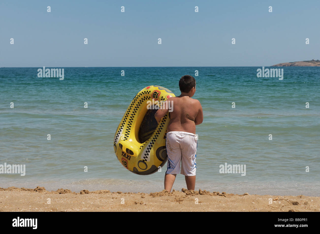 Obese boy on the beach Stock Photo, Royalty Free Image: 23989477 - Alamy