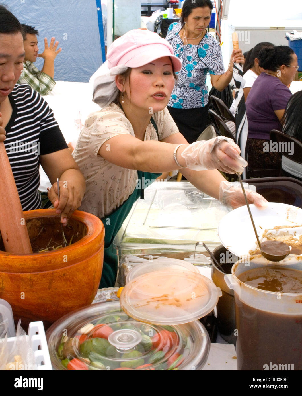 Busy Hmong outdoor restaurant making and serving food. Hmong Sports ...