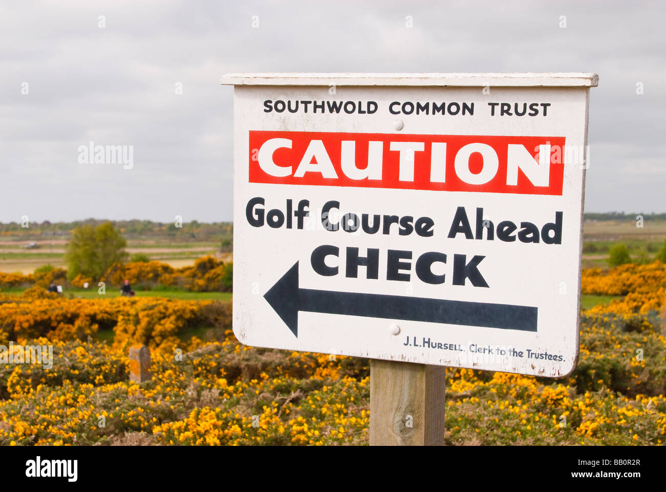 A warning sign on Southwold Common stating,caution golf course ahead ...