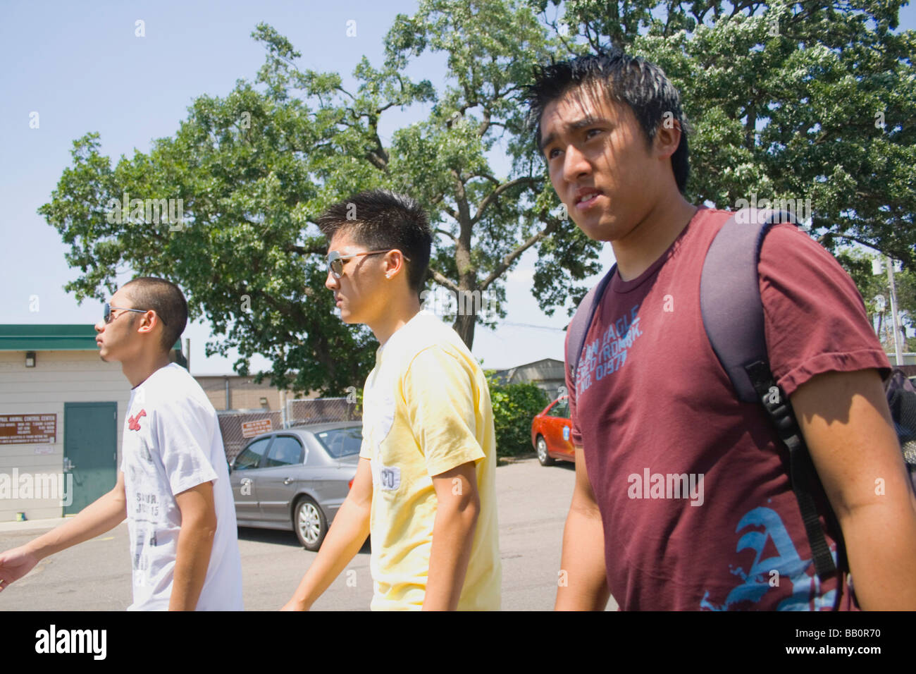 Hmong Asian teenagers walking to festival. Hmong Sports Festival ...