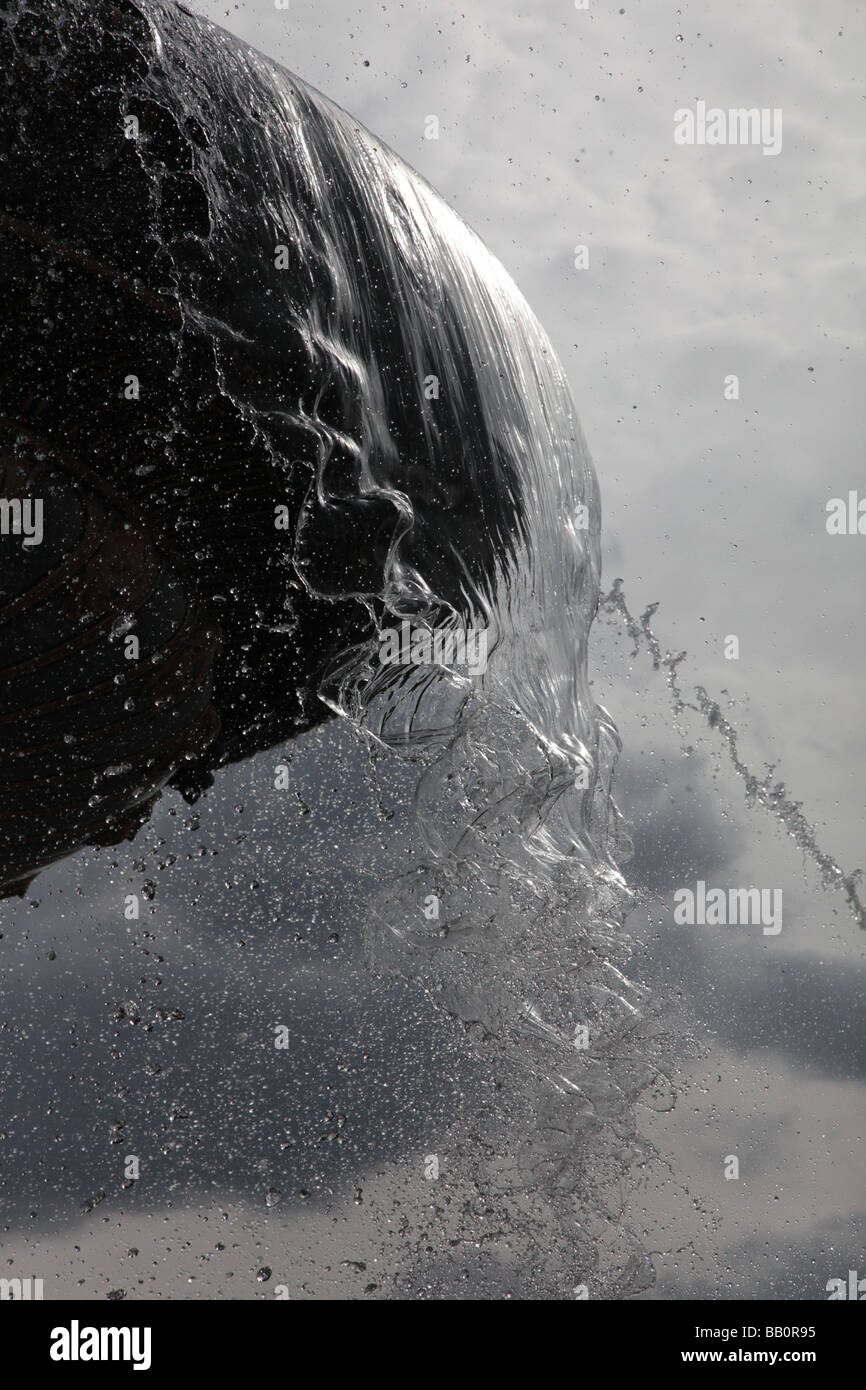 Water ripples in the wind looks like glass when frozen by a fast ...