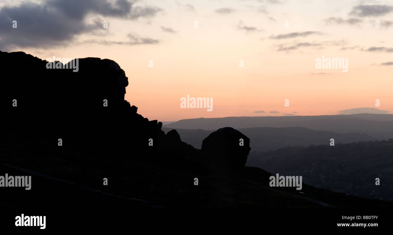 Sunset at the Cow and Calf rocks, a famous Yorkshire landmark on Ilkey ...
