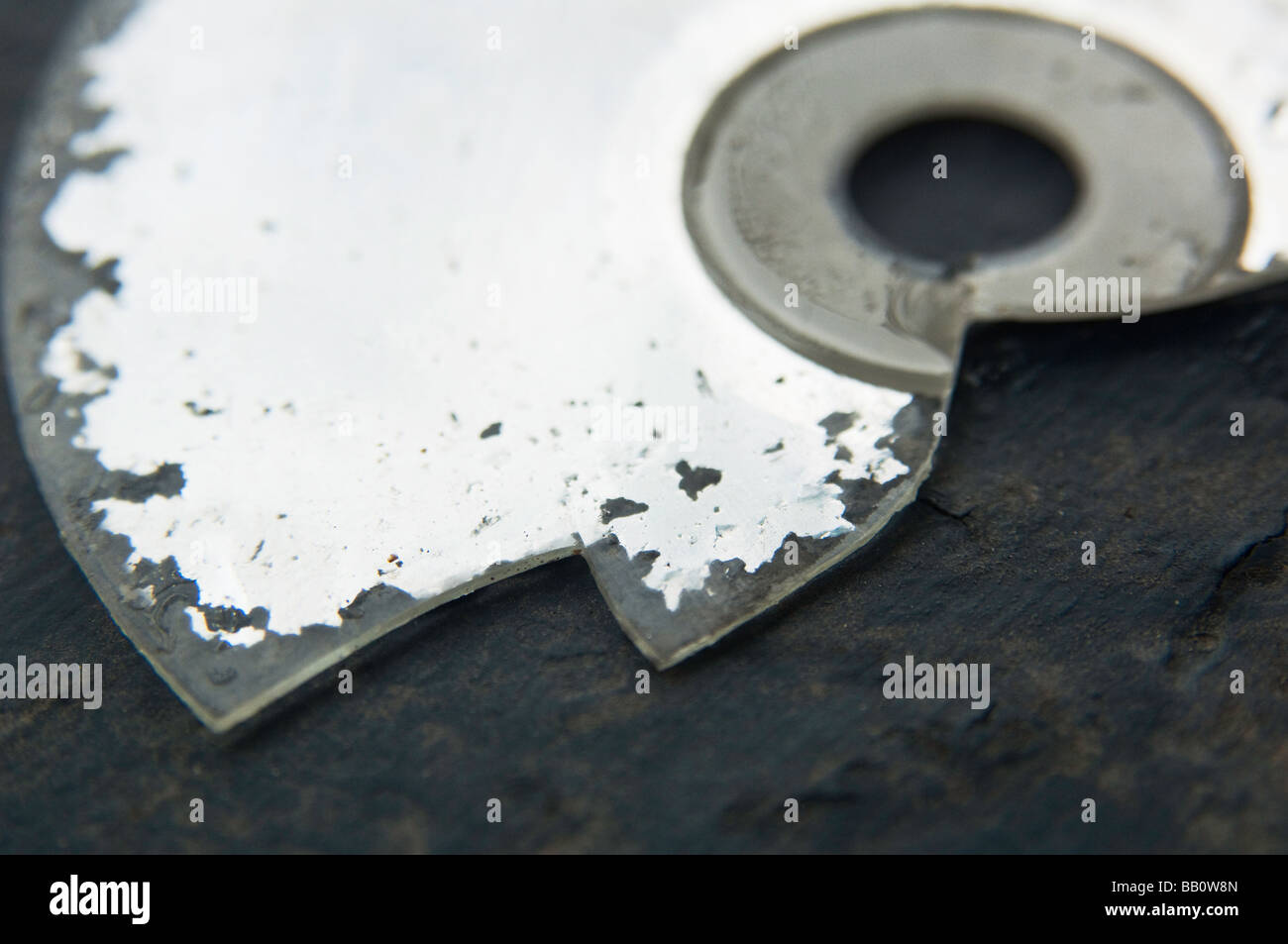 Battered and broken compact disc Stock Photo - Alamy