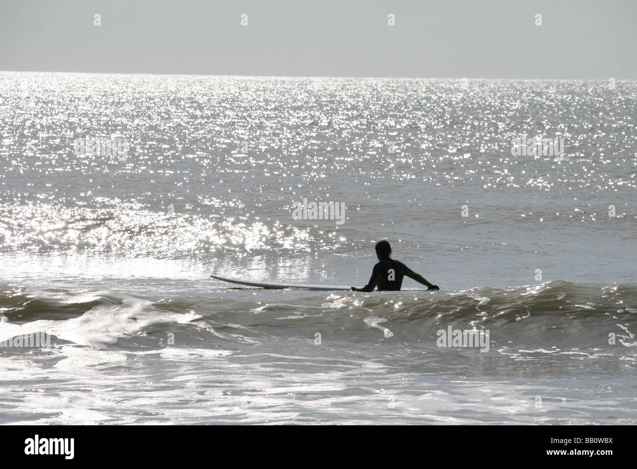 Riding surfer wearing wetsuit hi-res stock photography and images - Alamy