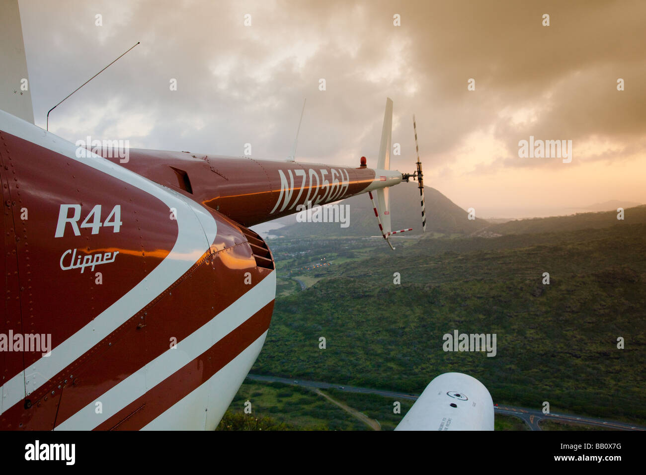 Back half of helicopter at sunset overlooking landscape Stock Photo - Alamy