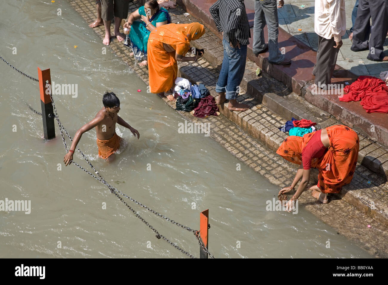 Pilgrims bathing in the Ganges river. Haridwar. Uttarakhand. India ...