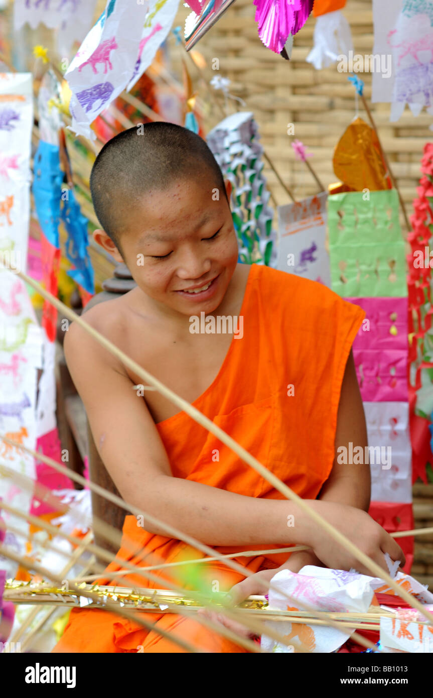 monks with songkran decorations at wat phan tao chiangmai thailand ...