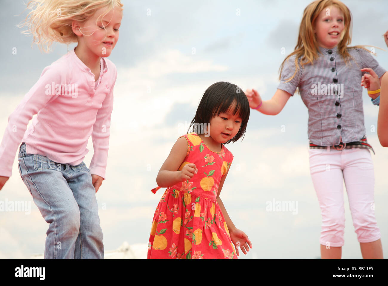 happy children playing Stock Photo - Alamy