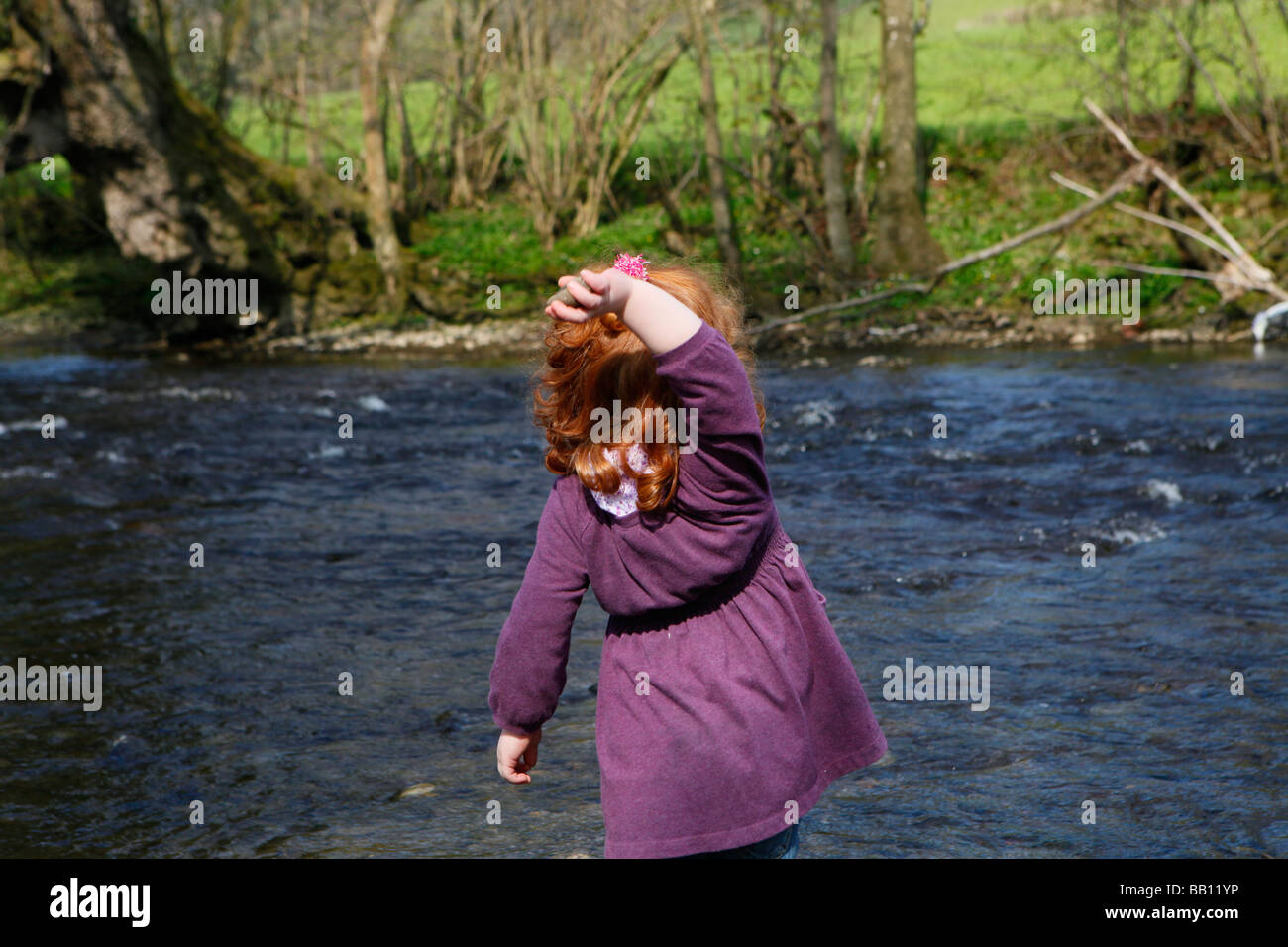 Girl throwing stones hi-res stock photography and images - Alamy