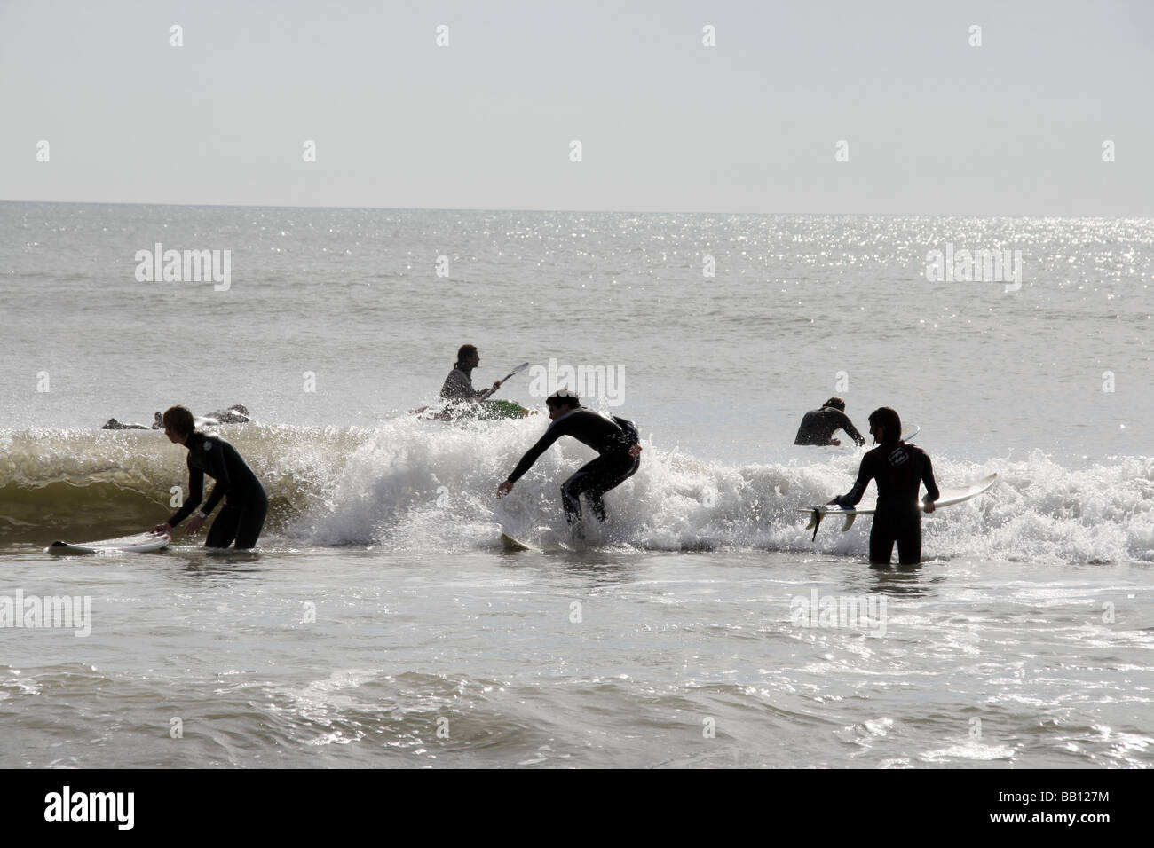 Two surfers in wet suits hi-res stock photography and images - Alamy