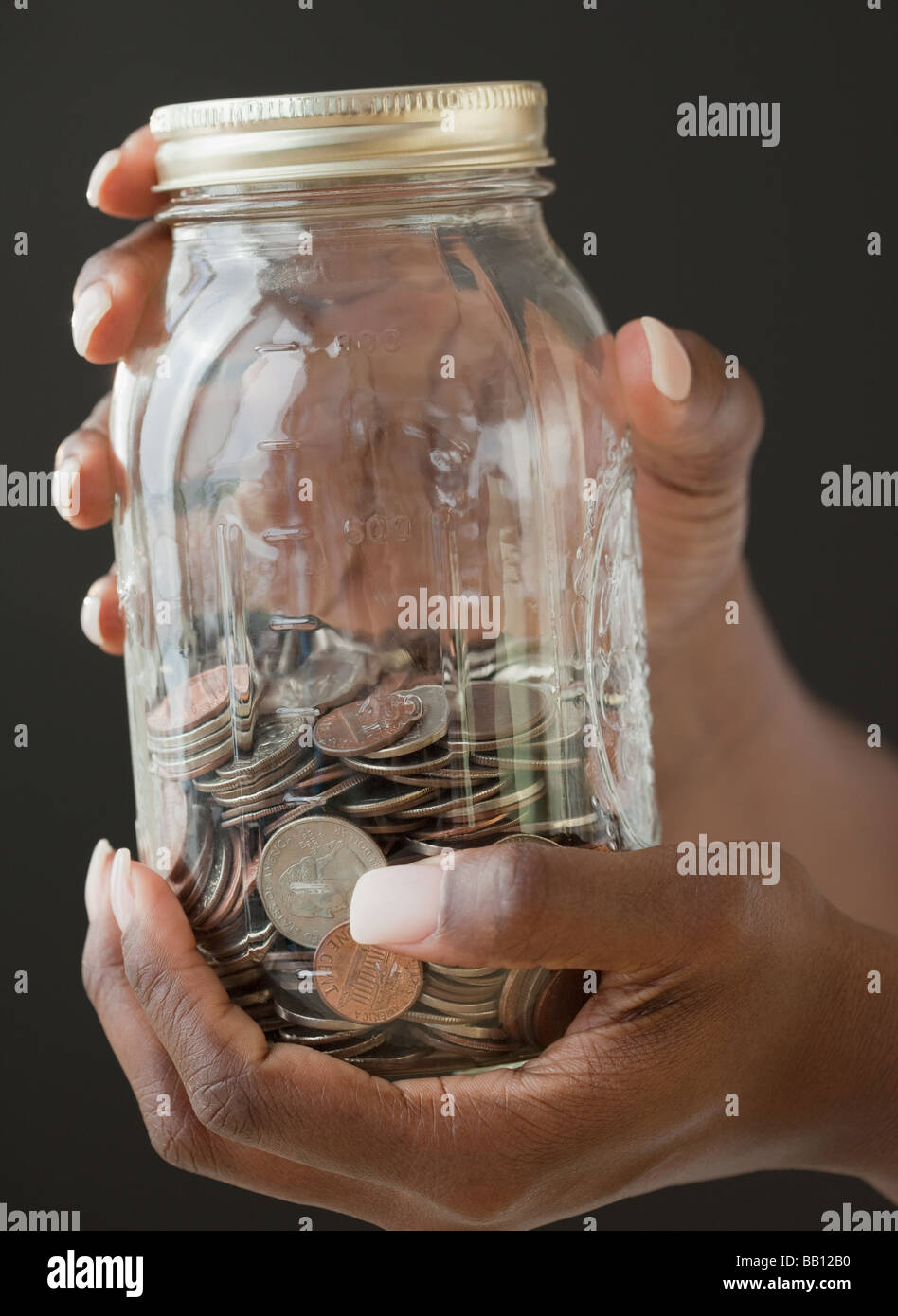 African group money hand hi-res stock photography and images - Alamy