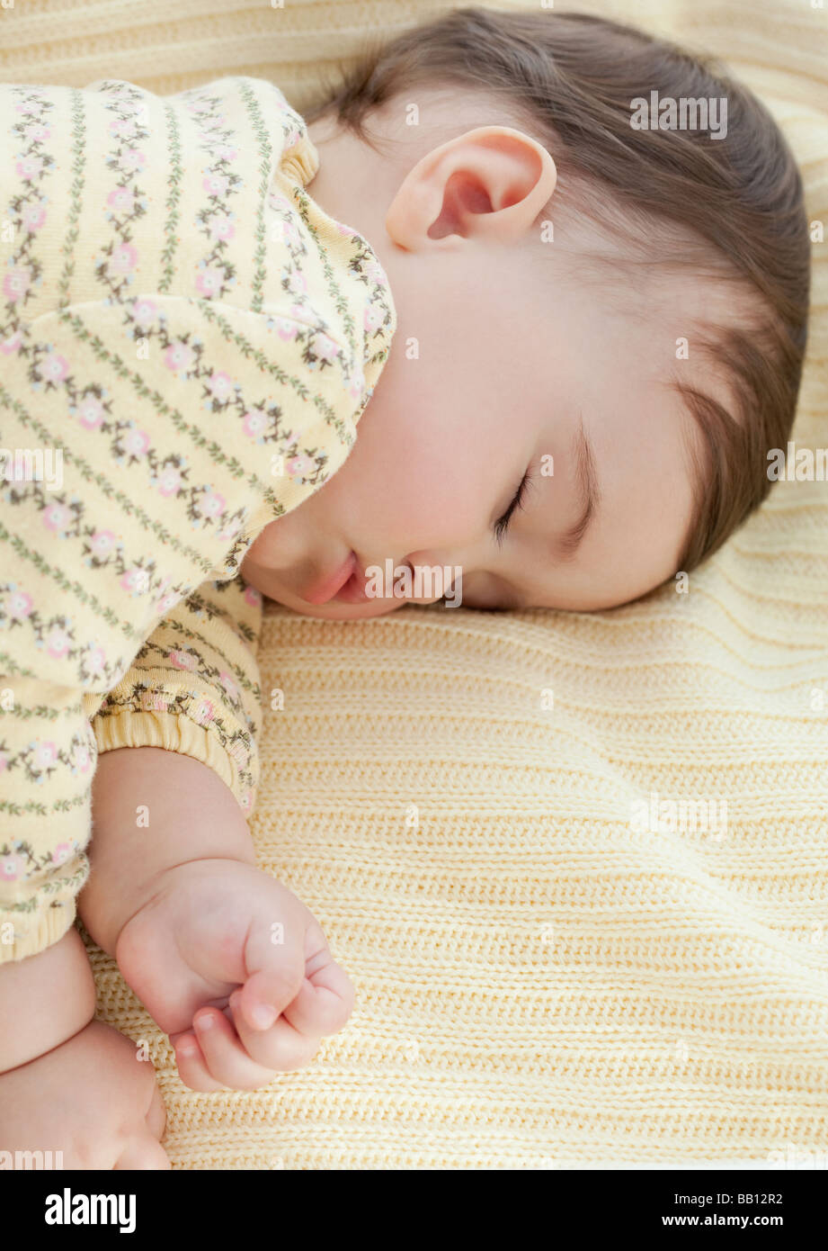 Mixed race baby girl sleeping Stock Photo - Alamy