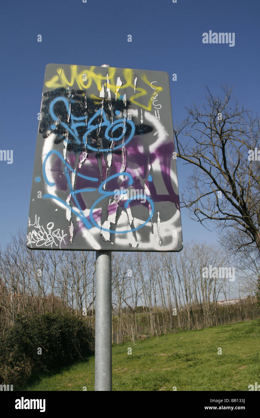 public information sign covered with graffiti in countryside Stock ...