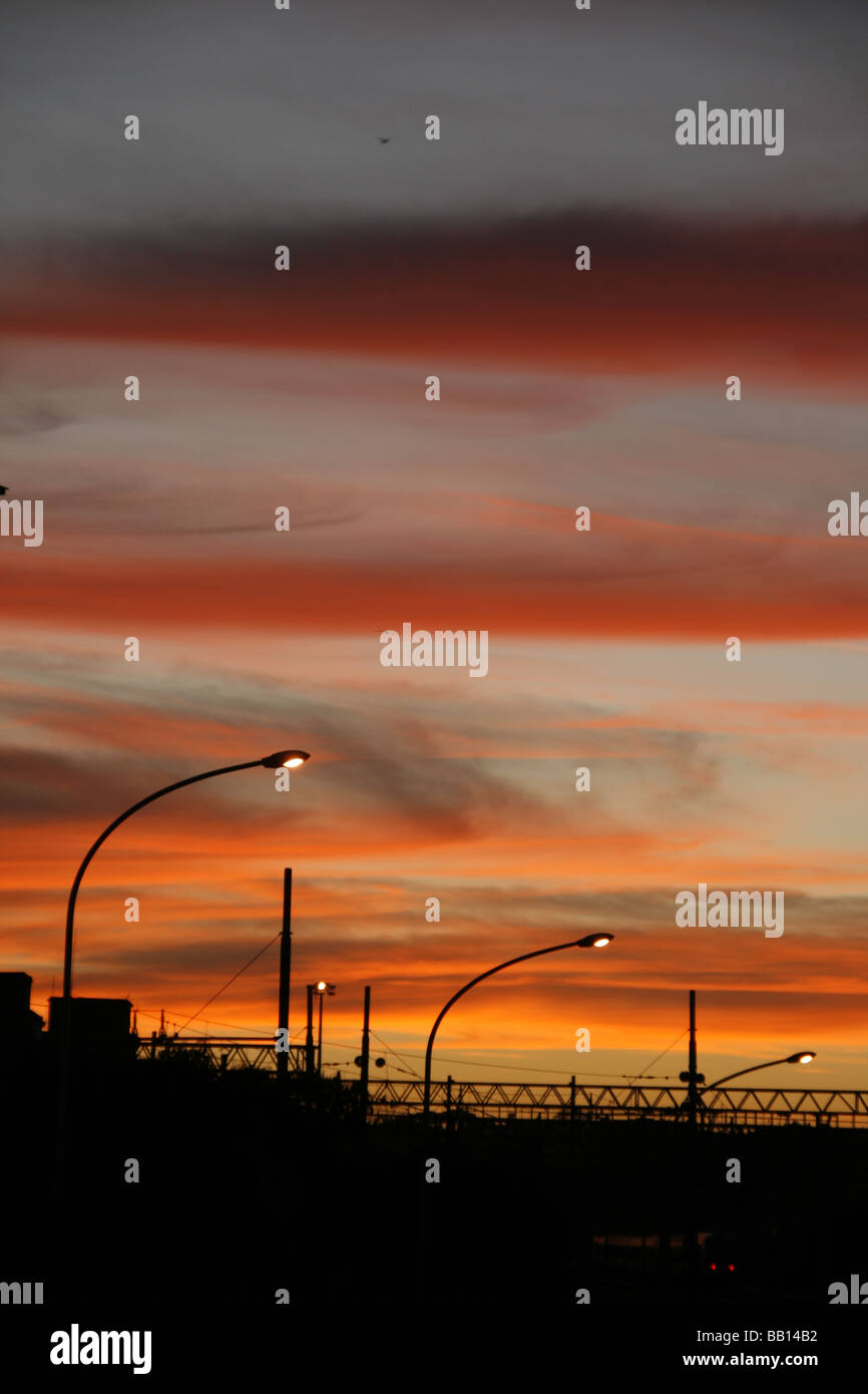 red sunset over an urban city landscape Stock Photo - Alamy