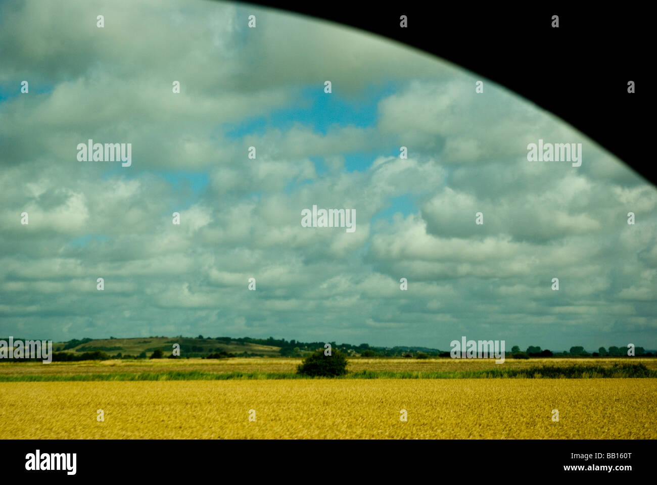 Cornfield and clouds from a car window Stock Photo - Alamy