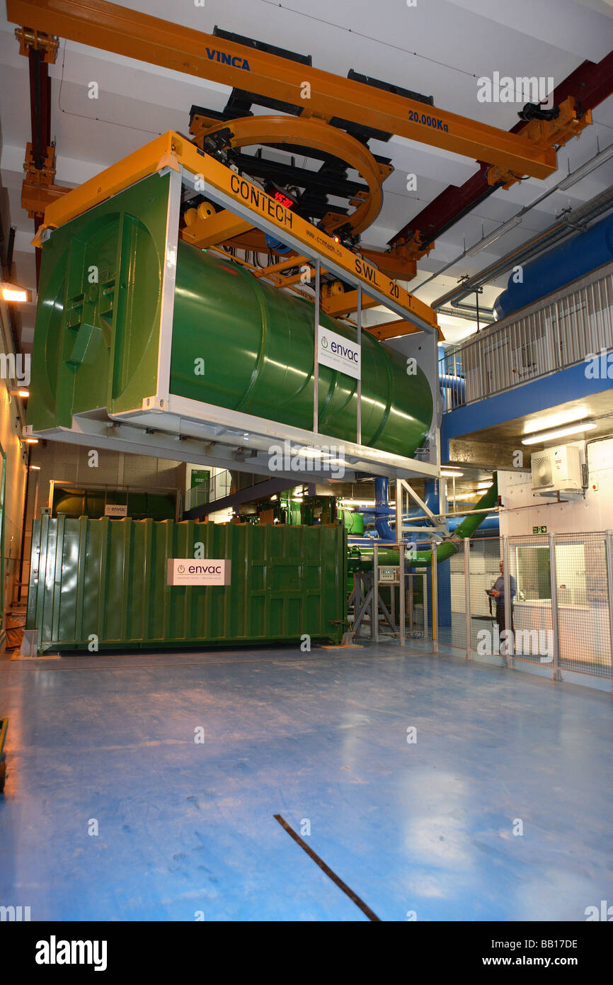 envac waste container held in crane at a transfer station Stock Photo ...