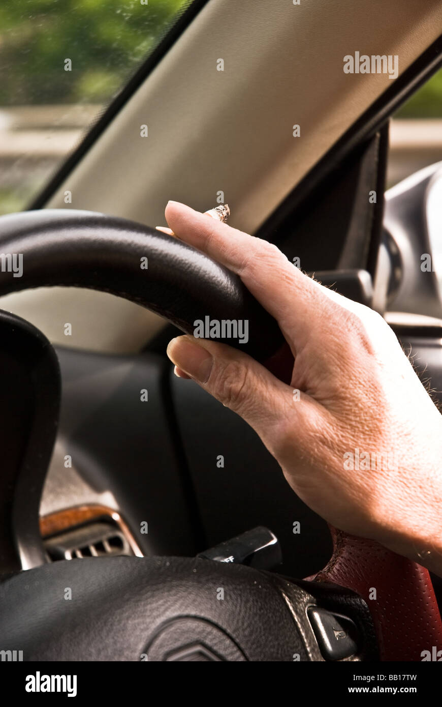Smoking Whilst Driving Stock Photo - Alamy