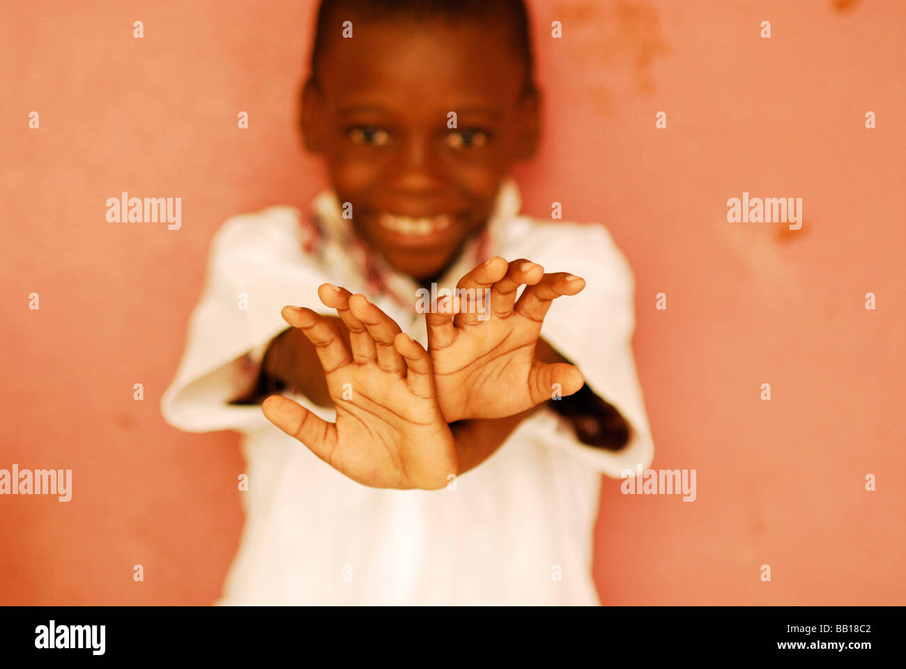 ANGOLA.Smiling eight-year-old african black boy Stock Photo - Alamy