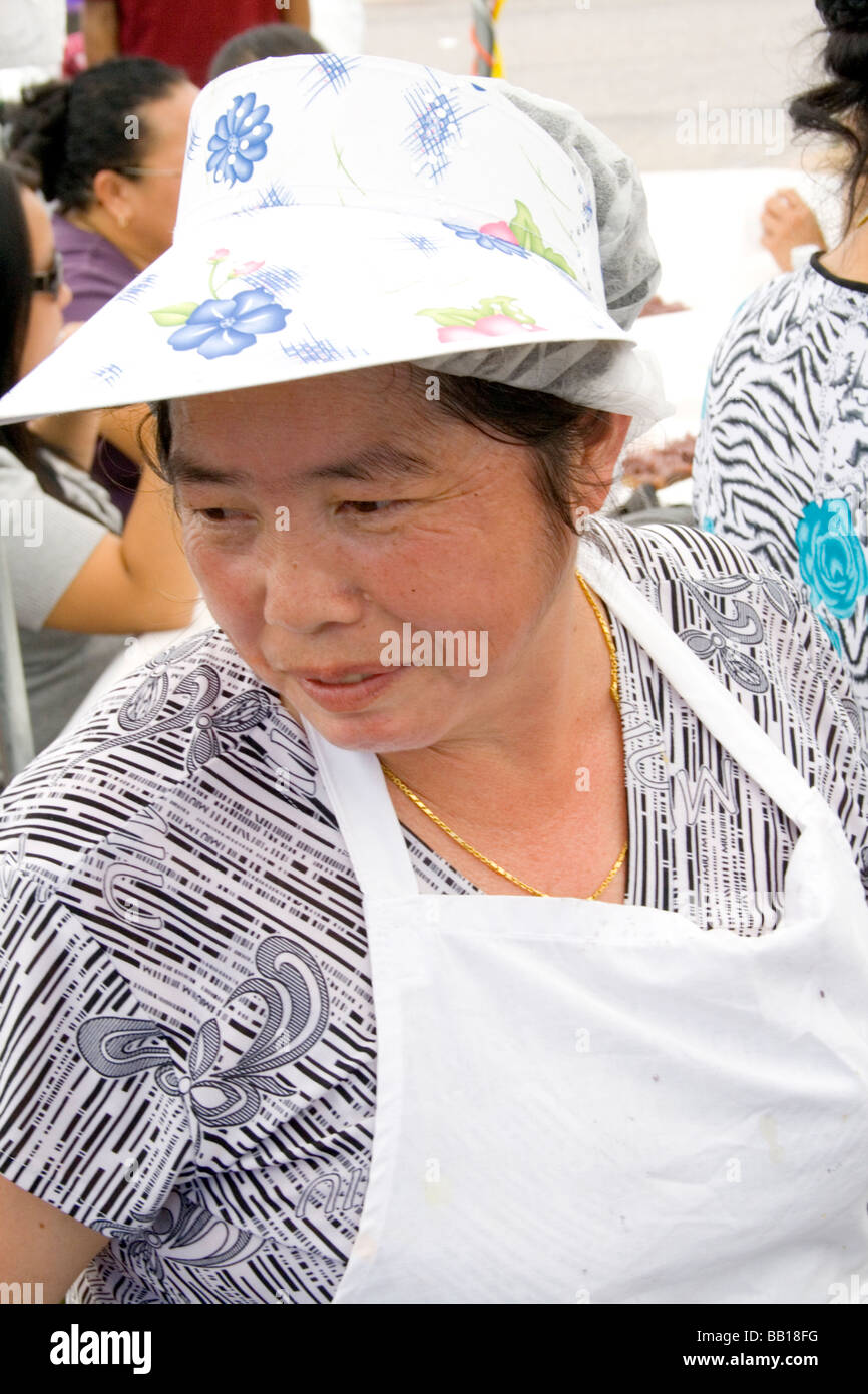 Busy Hmong restaurant kitchen worker. Hmong Sports Festival McMurray ...
