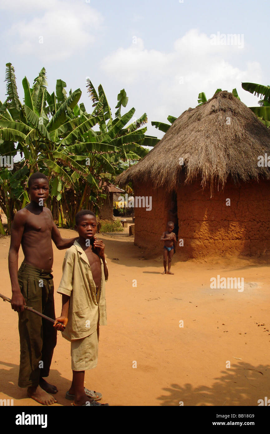 Benin Adjohoun African adolescents a traditional african hut on the ...