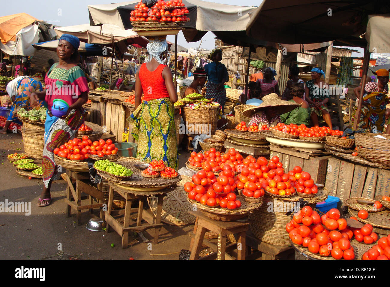 Benin, Cotonou. Tomato and onion street stalls in Africa (RF Stock ...