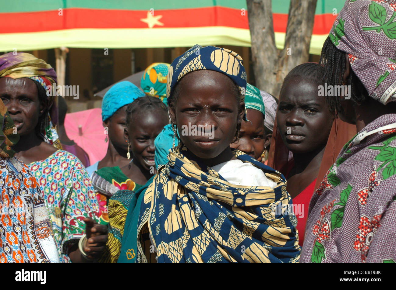CAMEROON, Maga. A group of african young boys & girls, wearing ...