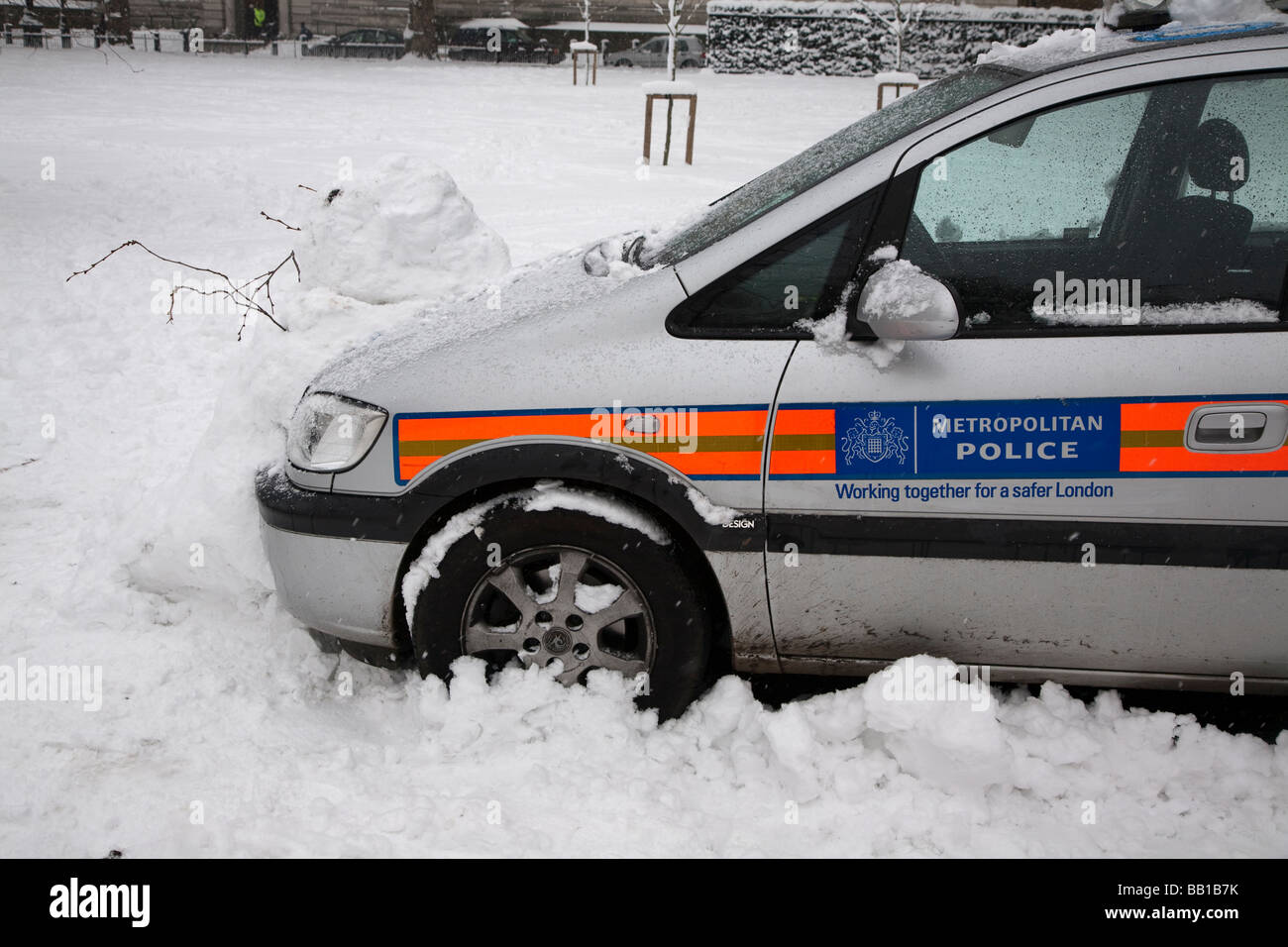 Police car and snowman Stock Photo - Alamy