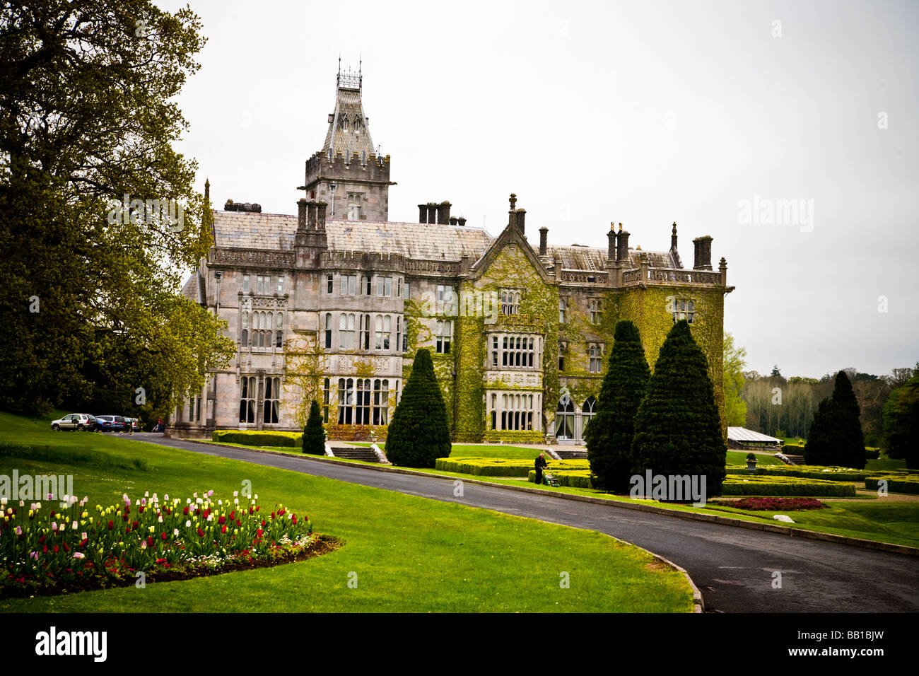 Facade of the Adare Manor house in County limerick showing landscaped ...