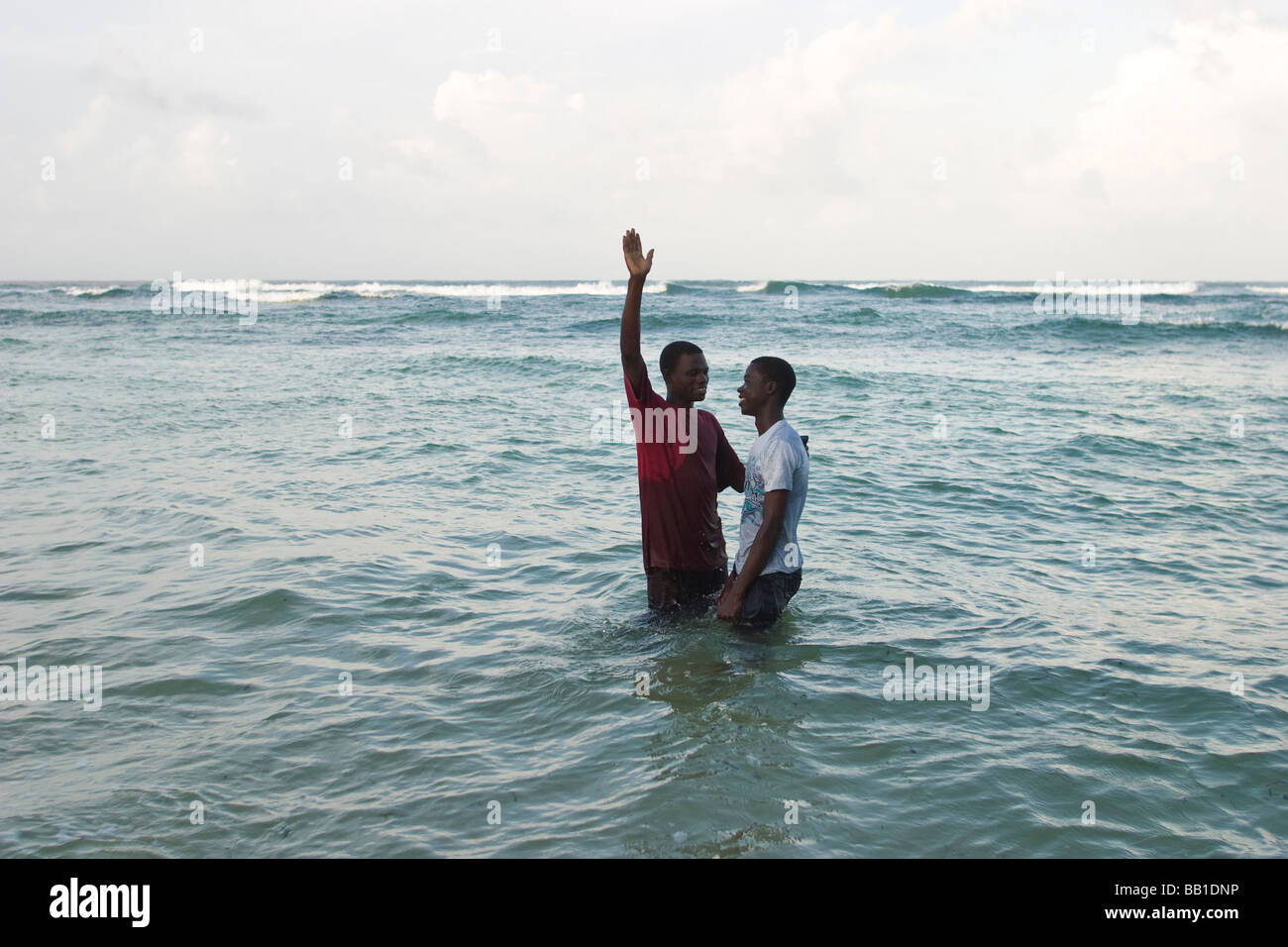Young male being baptized in Takaungu, Kenya Stock Photo - Alamy
