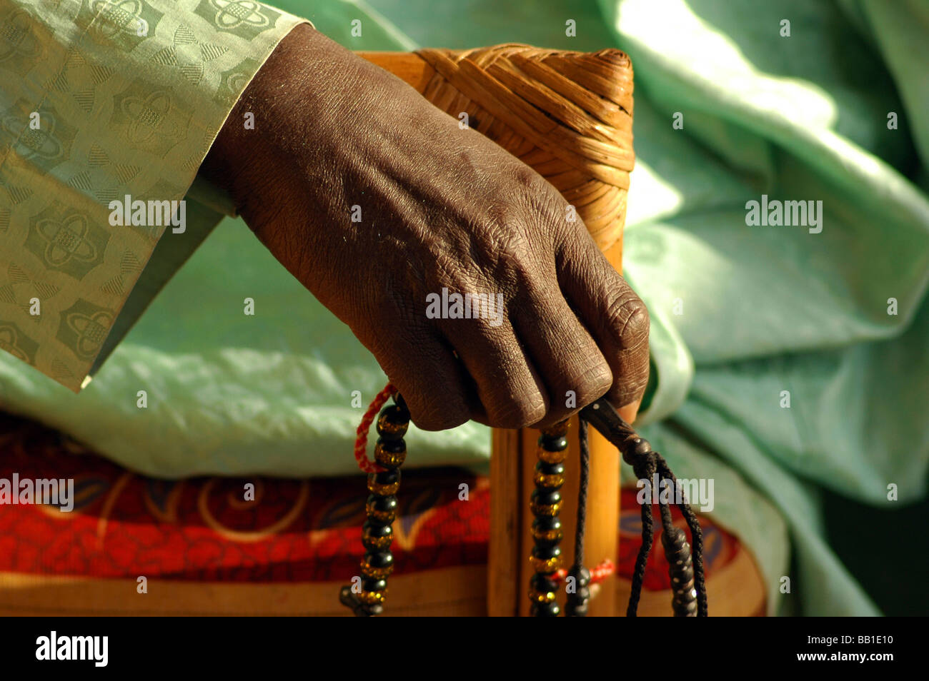MALI, Bamako. Black hand holding a muslim prayer chaplet (RF Stock ...