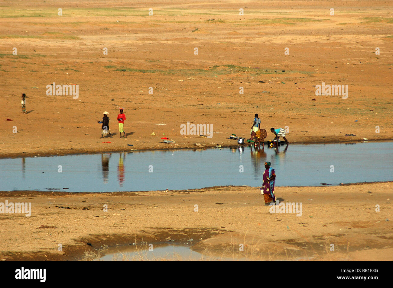 MALI, Djenne. Men on the shore of the niger river at sunset (RF Stock ...