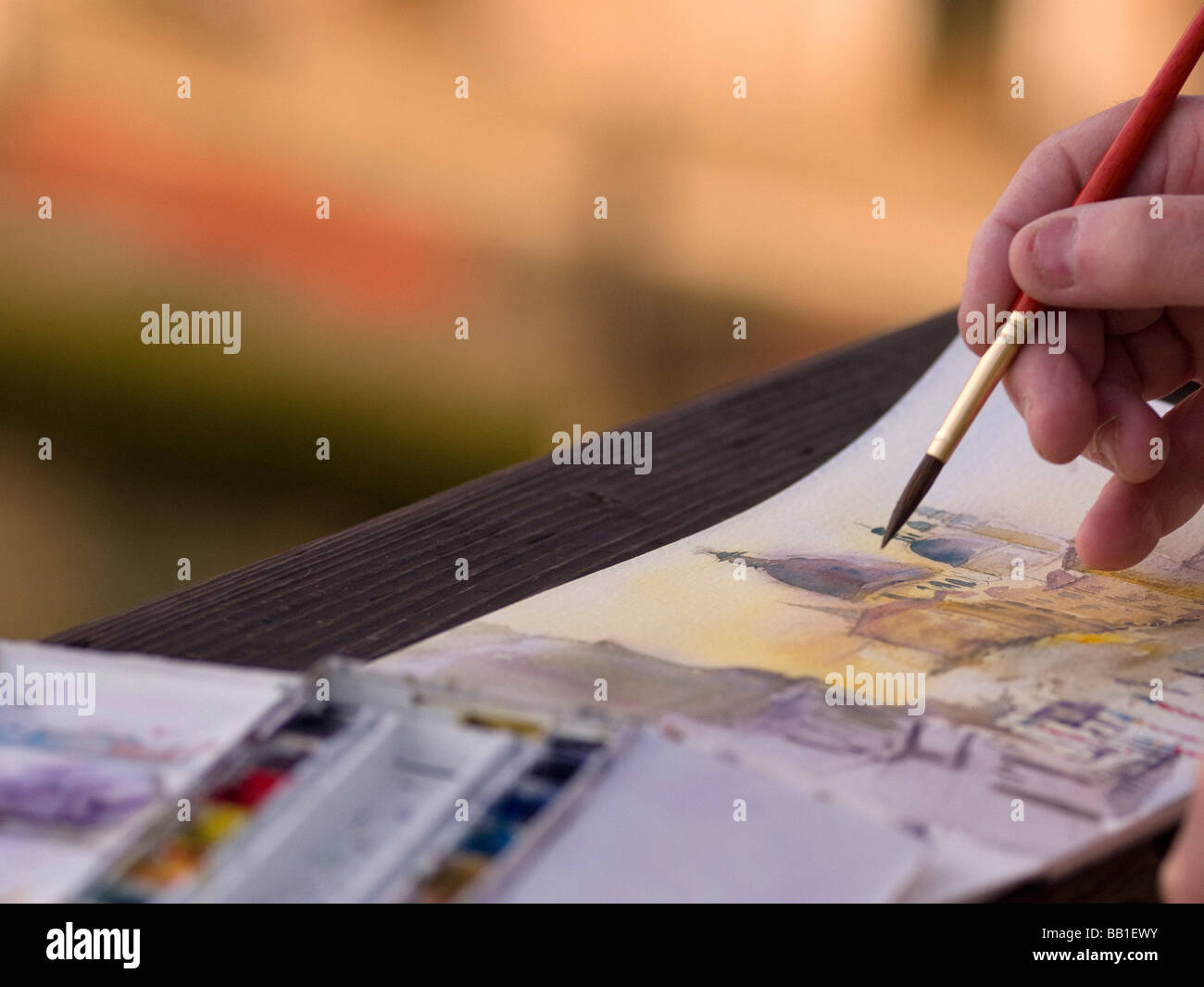 Artist painting building; Venice, Italy Stock Photo - Alamy