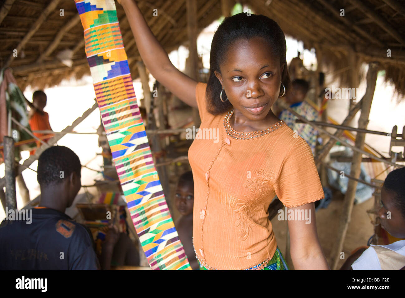 Woman showing off her craft, village of Apedokoe, Togo, Africa Stock ...