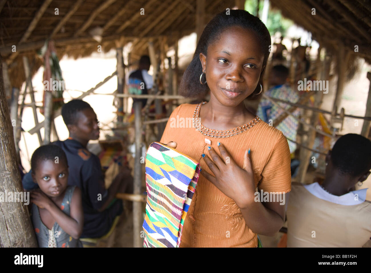 Woman showing off her craft, village of Apedokoe, Togo, Africa Stock ...