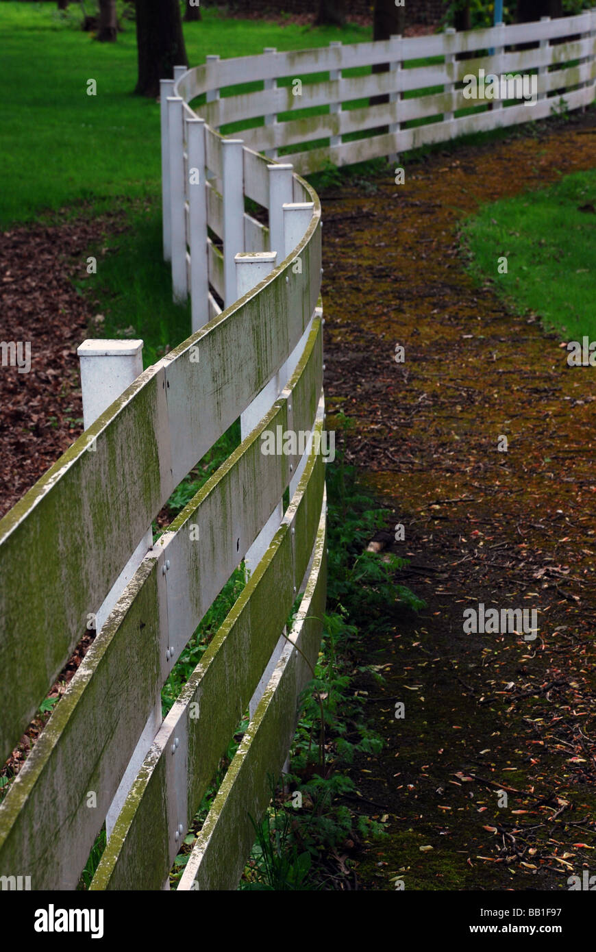 White fence leading into the distance Stock Photo - Alamy