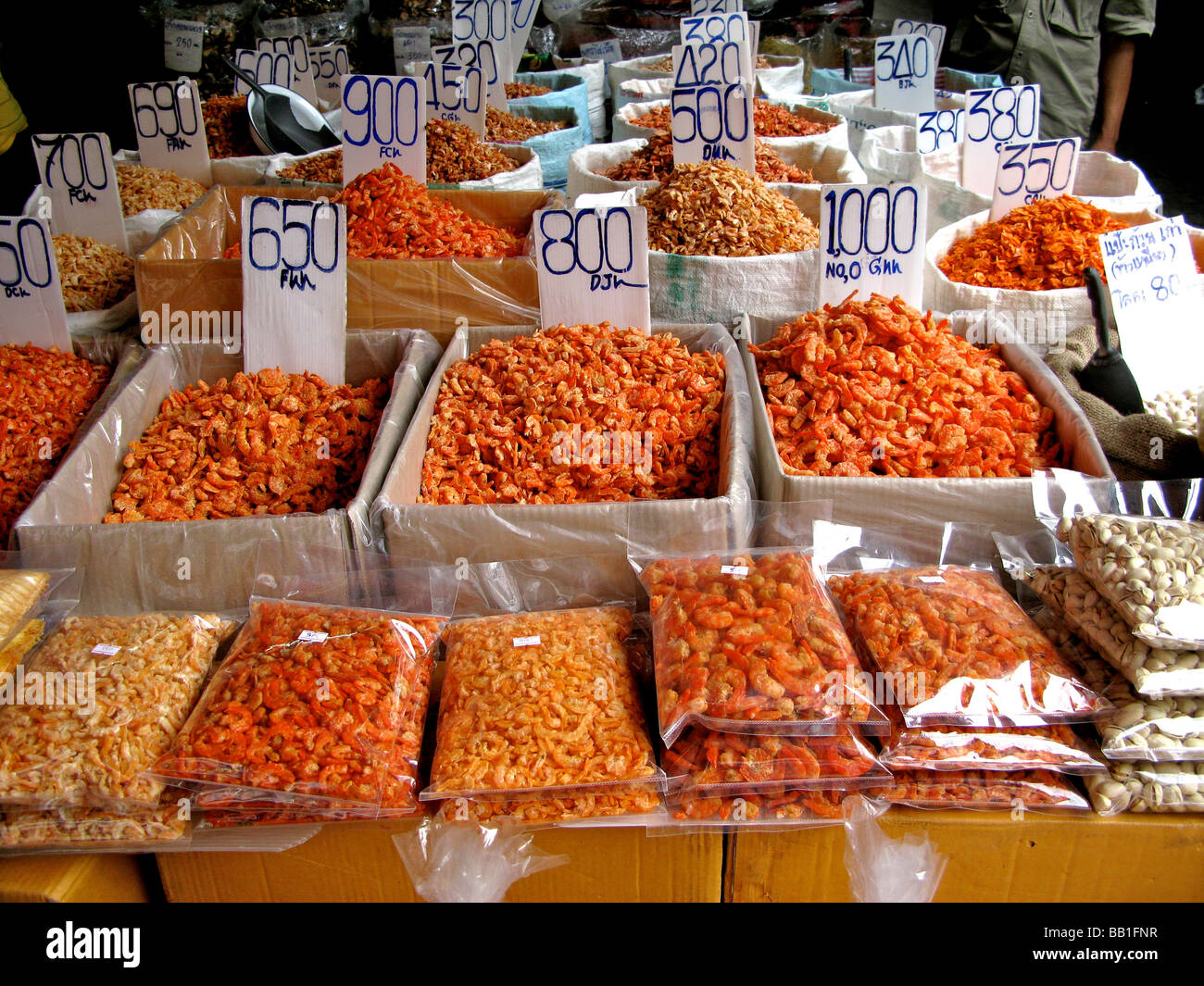 Market stall selling dried food Thailand Stock Photo - Alamy