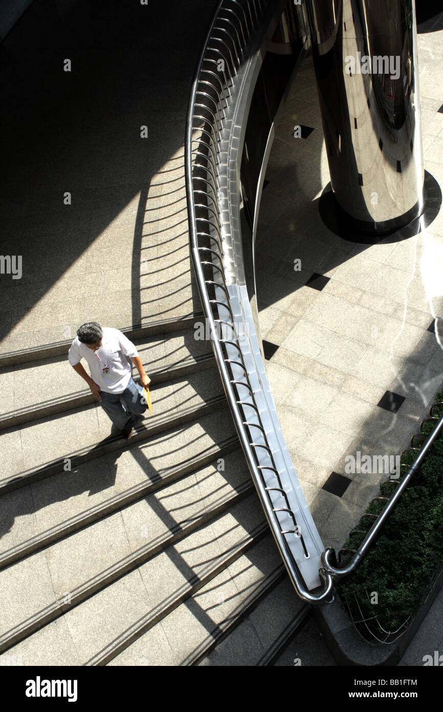 A man walking on stair Stock Photo - Alamy
