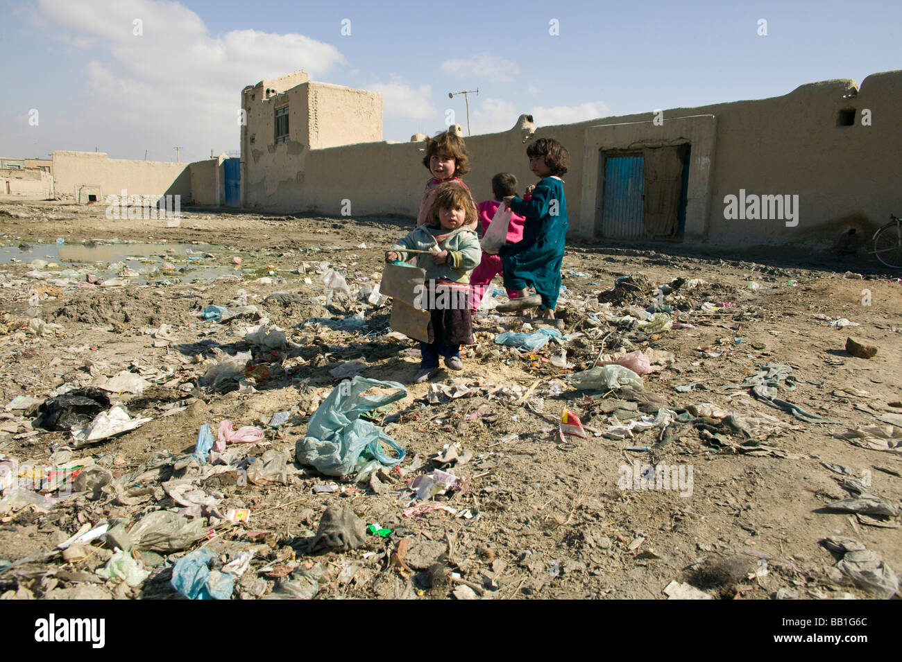 Children in garbage filled streets of Kabul, Afghanistan Stock Photo ...