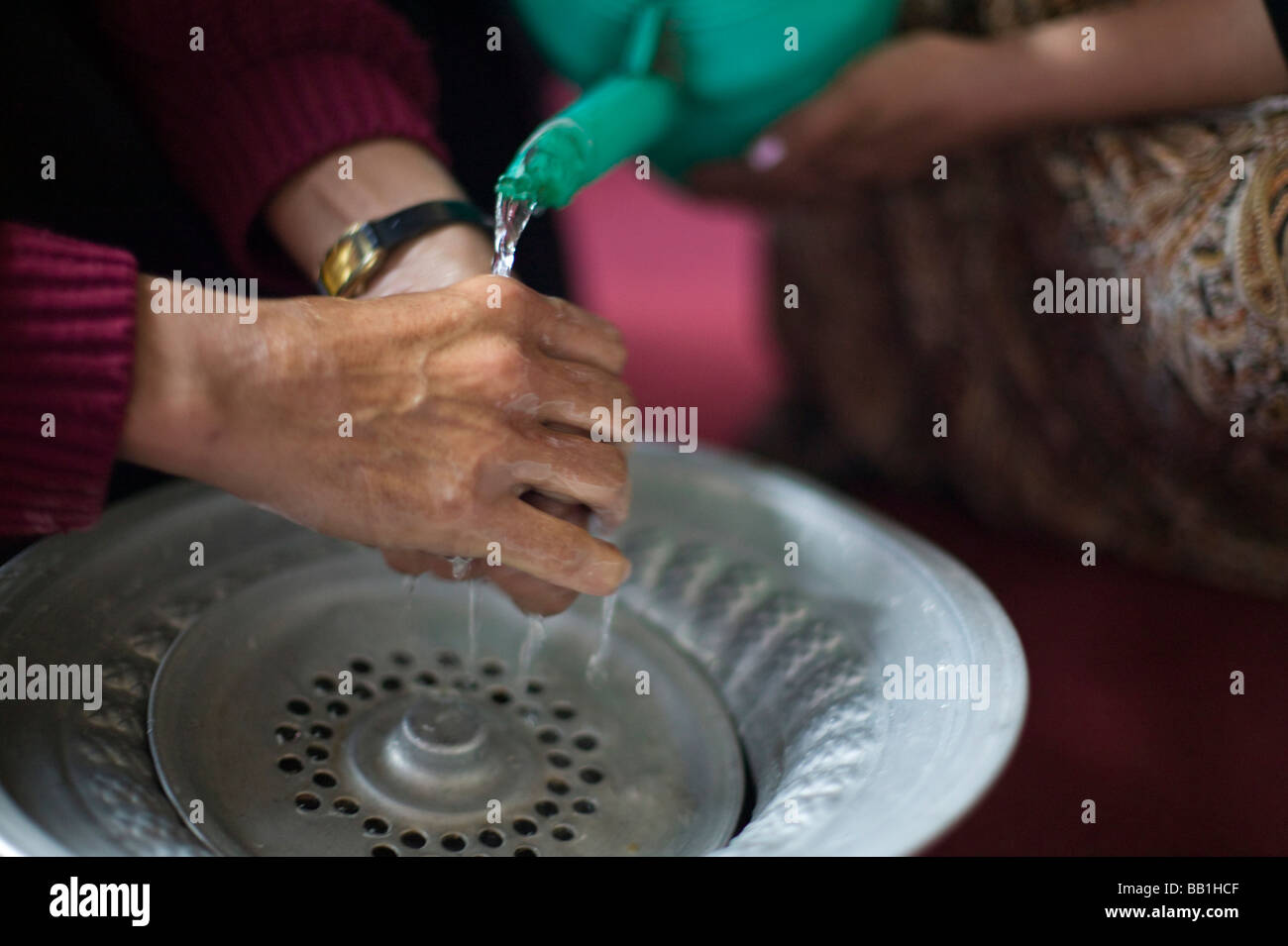 Woman washing her hands Kabul Afghanistan Stock Photo - Alamy