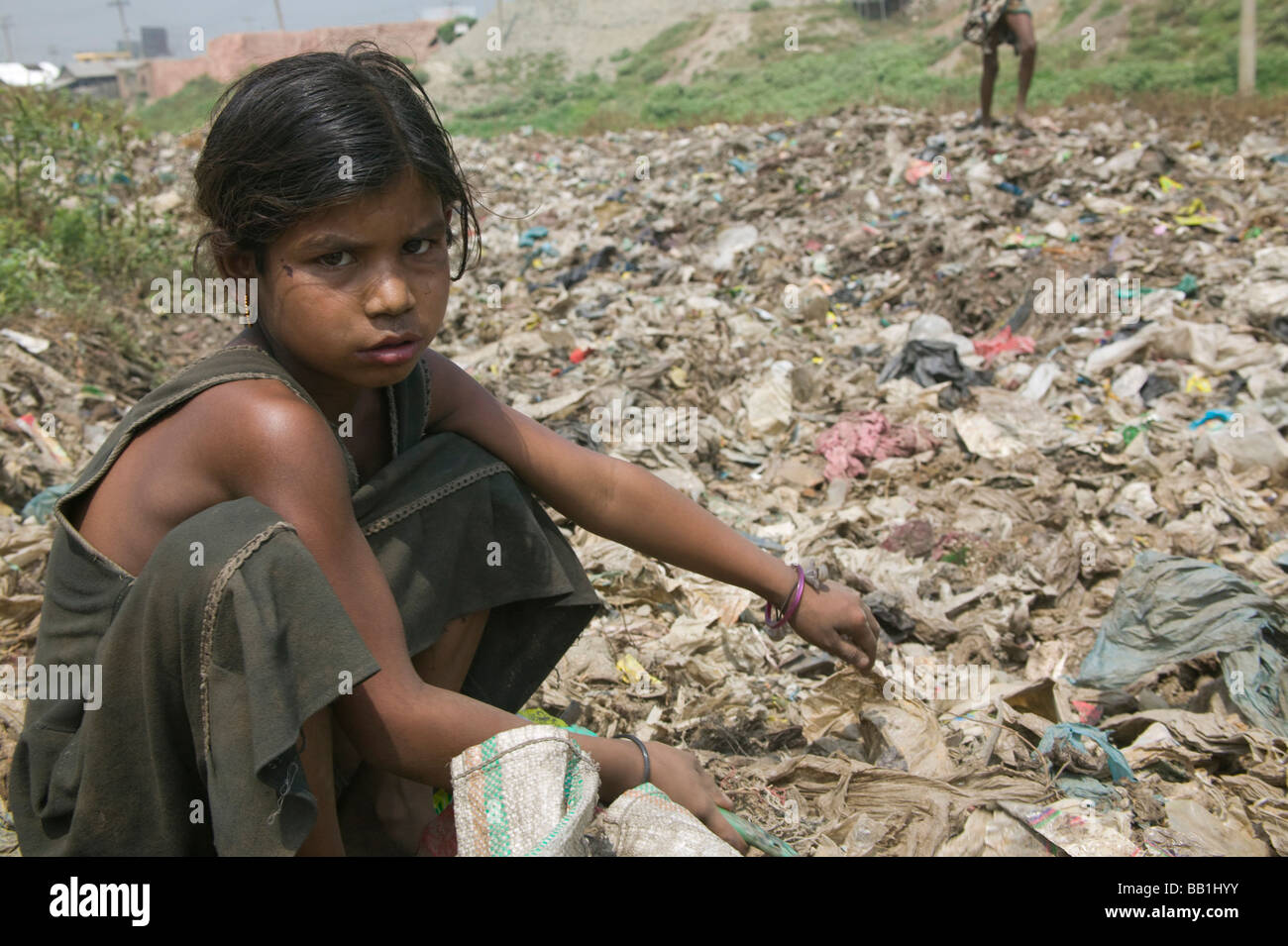 Children scavenging in garbage dump, Dhaka, Bangladesh Stock Photo - Alamy