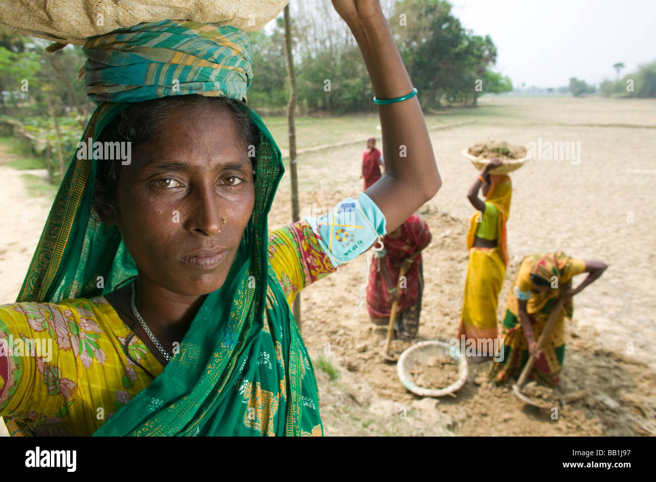 Women working on the road maintenance project in rural area outside of ...